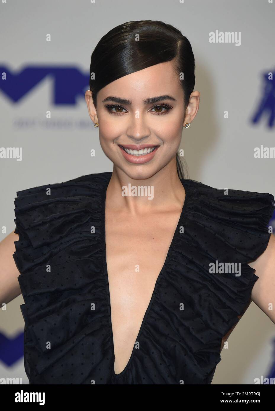 Sofia Carson arrives at the MTV Video Music Awards at The Forum on Sunday, Aug. 27, 2017, in ...