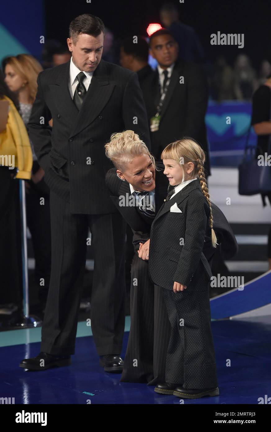 Carey Hart, from left, Pink and their daughter Willow Hart arrive at ...