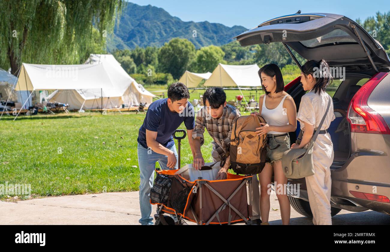 A group of people at the campsite Stock Photo - Alamy