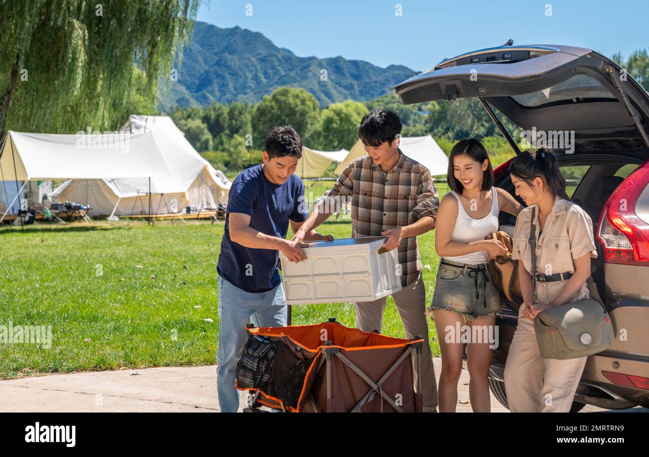 A group of people at the campsite Stock Photo - Alamy