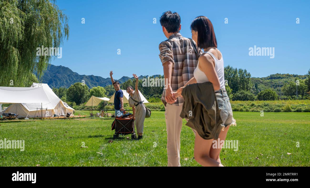 A group of people at the campsite Stock Photo - Alamy