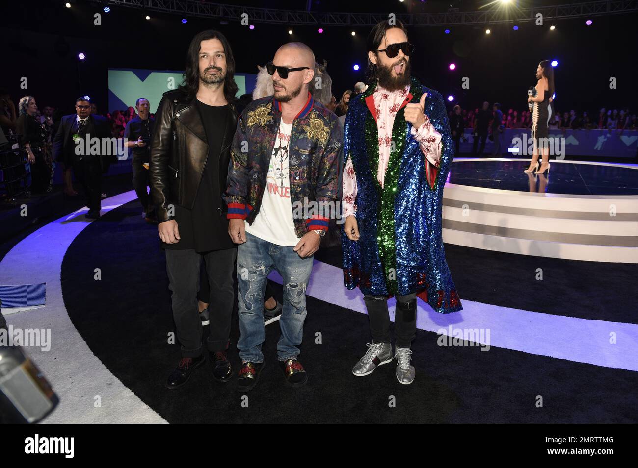 Tomo Milicevic, from left, Shannon Leto and Jared Leto arrives at the ...