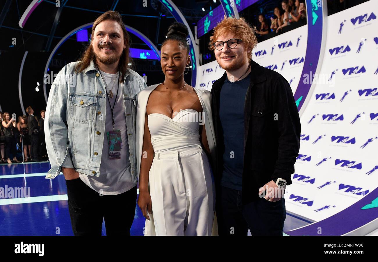 Jason Koenig, from left, Jennie Pegouskie and Ed Sheeran arrive at the ...