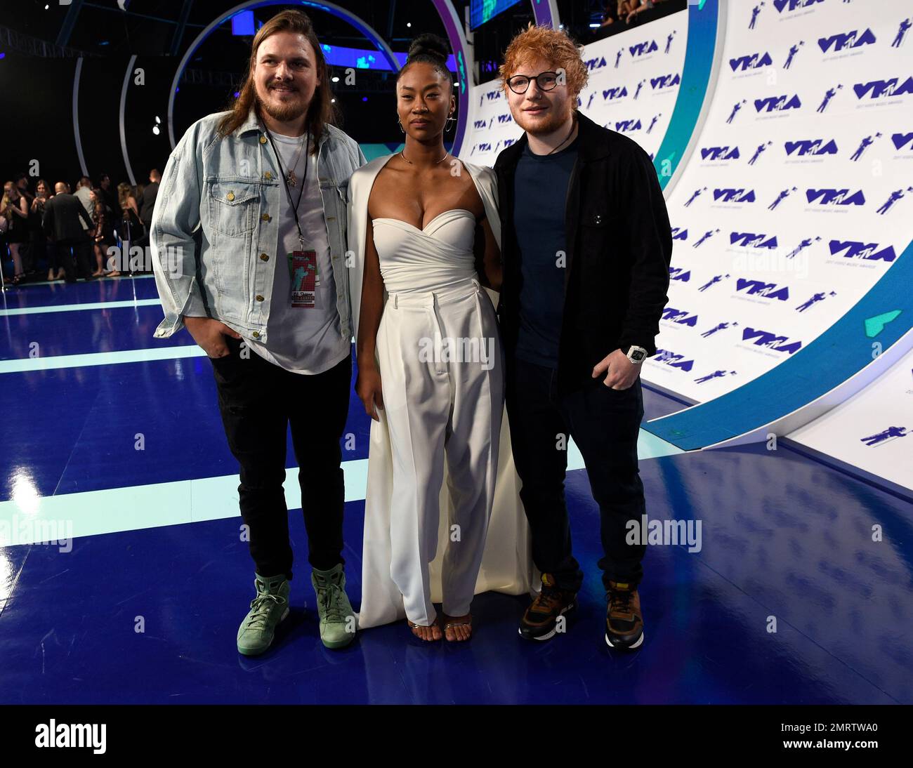 Jason Koenig, from left, Jennie Pegouskie and Ed Sheeran arrive at the ...