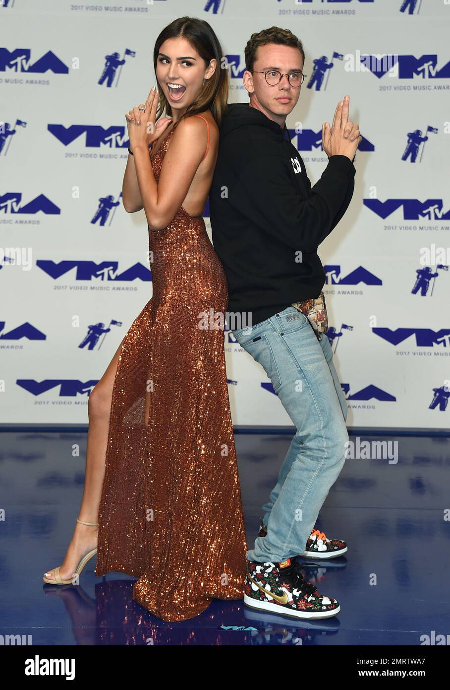 Jessica Andrea, left, and Logic arrive at the MTV Video Music Awards at ...