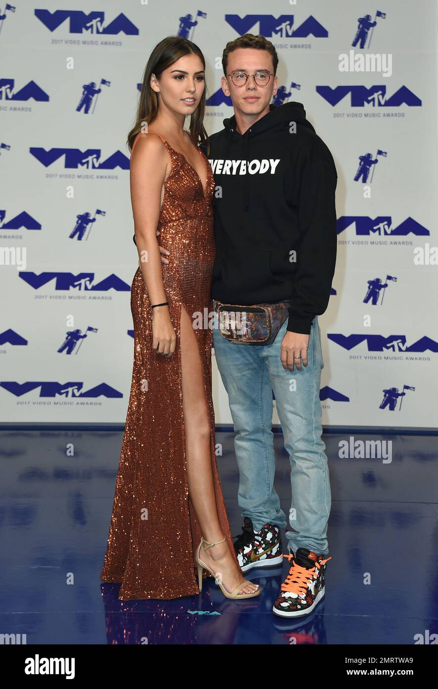 Jessica Andrea, left, and Logic arrive at the MTV Video Music Awards at ...