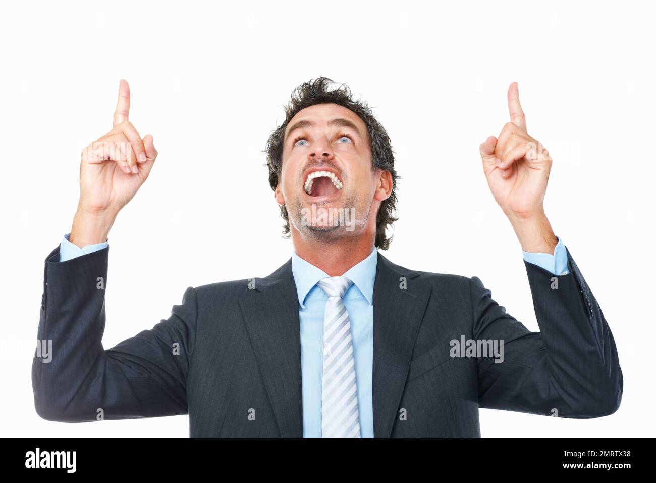 Business man looking and pointing upwards. Happy surprised business man ...