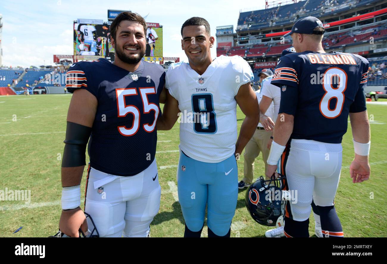 Chicago Bears center Hroniss Grasu (55) poses with Tennessee Titans ...