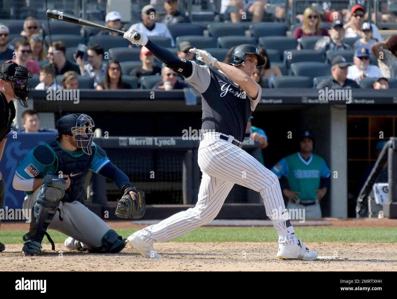 New York Yankees' Greg Bird, right, hits a two-RBI single as Seattle ...