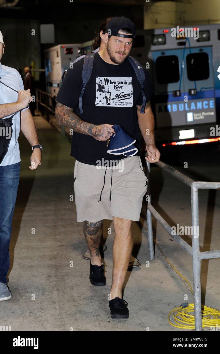 Tennessee Titans tackle Taylor Lewan arrives for an NFL football ...