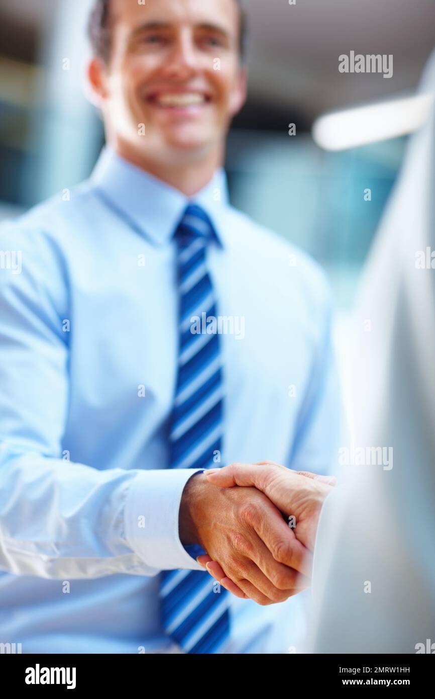 Youve got yourself a deal. two people shaking hands in a corporate ...