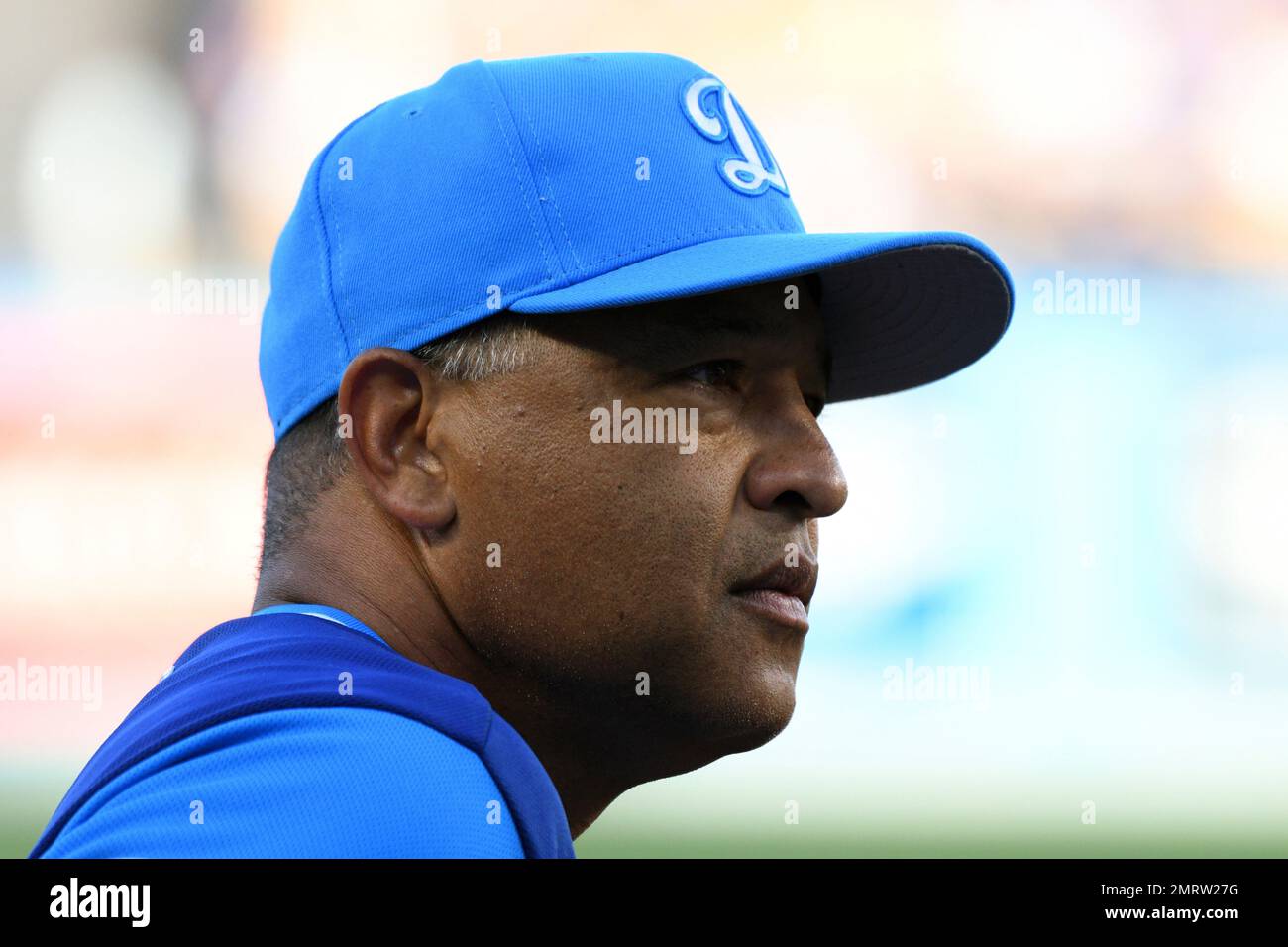 Los Angeles Dodgers manager Dave Roberts watches the action from the ...