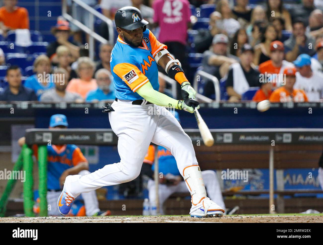 Miami Marlins' Marcell Ozuna hits a home run during the fourth inning ...