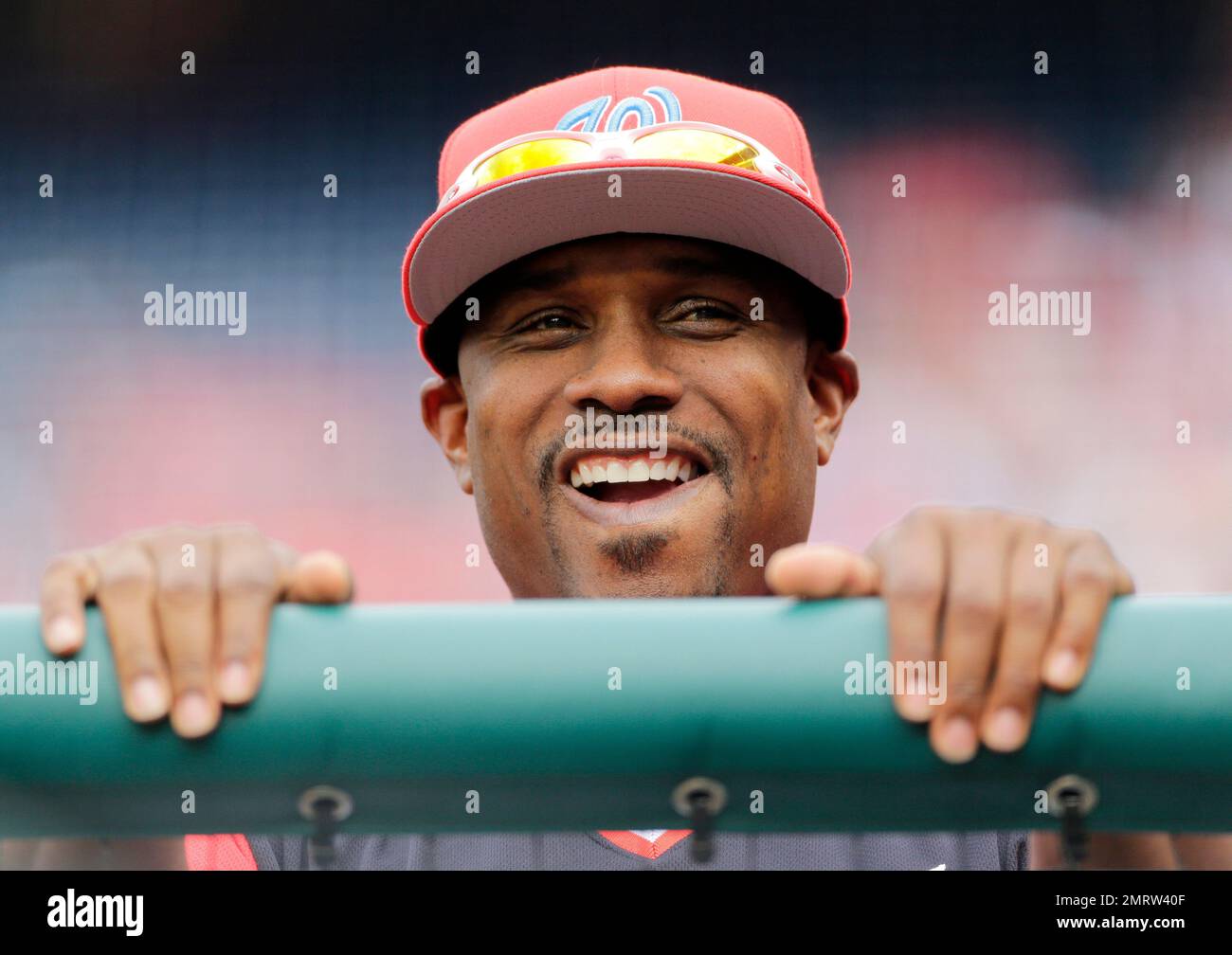 Washington Nationals assistant hitting coach Jacque Jones smiles in the ...