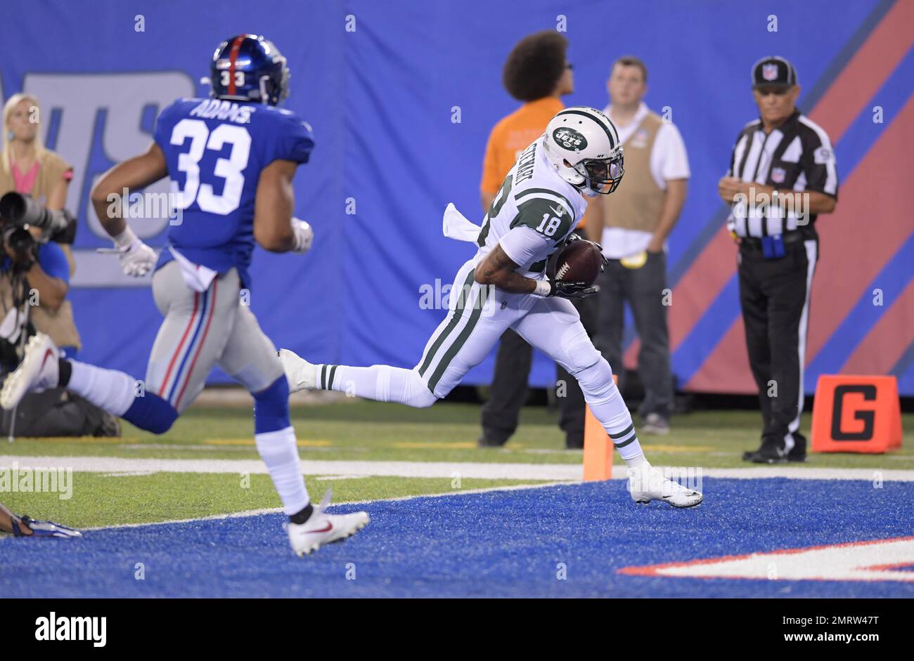 New York Jets' ArDarius Stewart (18) runs past New York Giants' Andrew ...