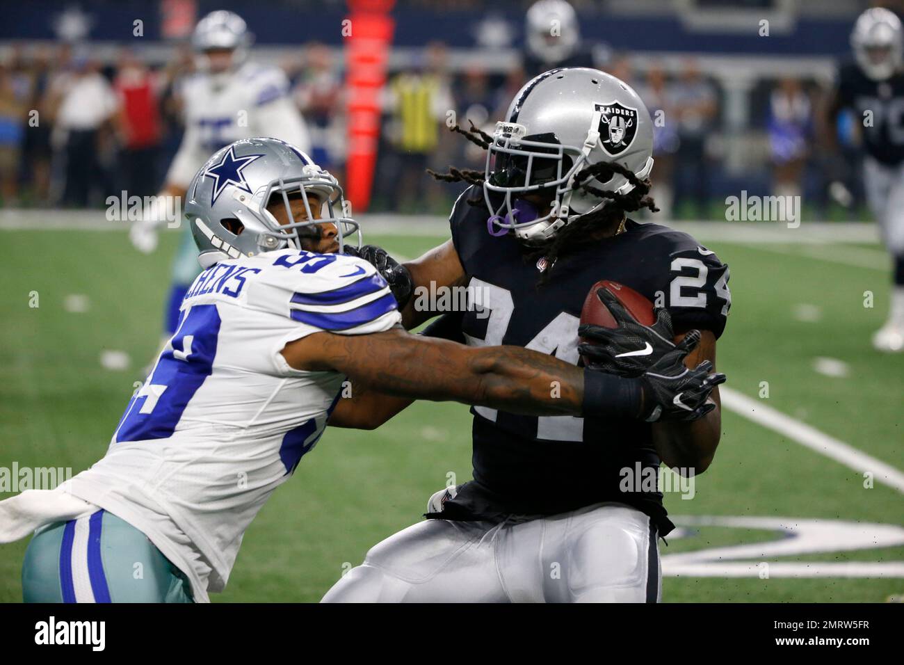 Dallas Cowboys linebacker Anthony Hitchens (59) tries to stop Oakland ...