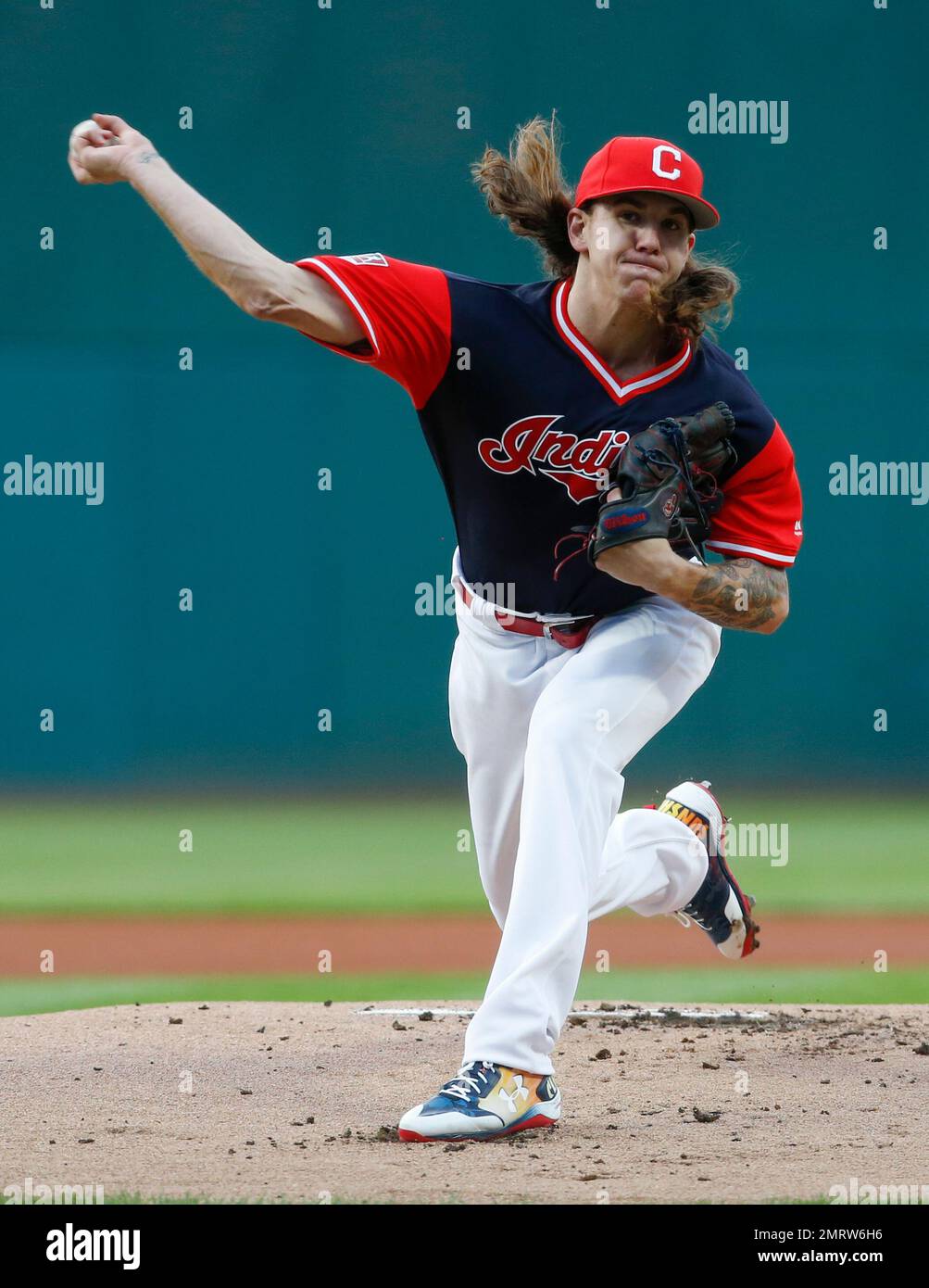 Cleveland Indians starting pitcher Mike Clevinger delivers against the ...