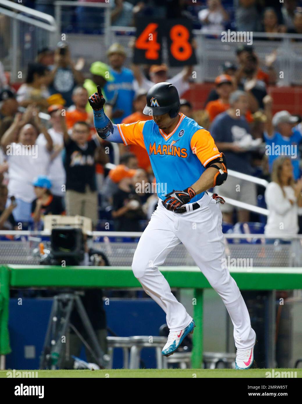 Miami Marlins' Giancarlo Stanton celebrates after he hit a two-run home ...
