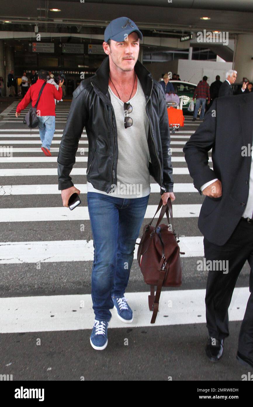 Luke Evans arrives at LAX. Los Angeles, CA. 27th February 2015 Stock ...