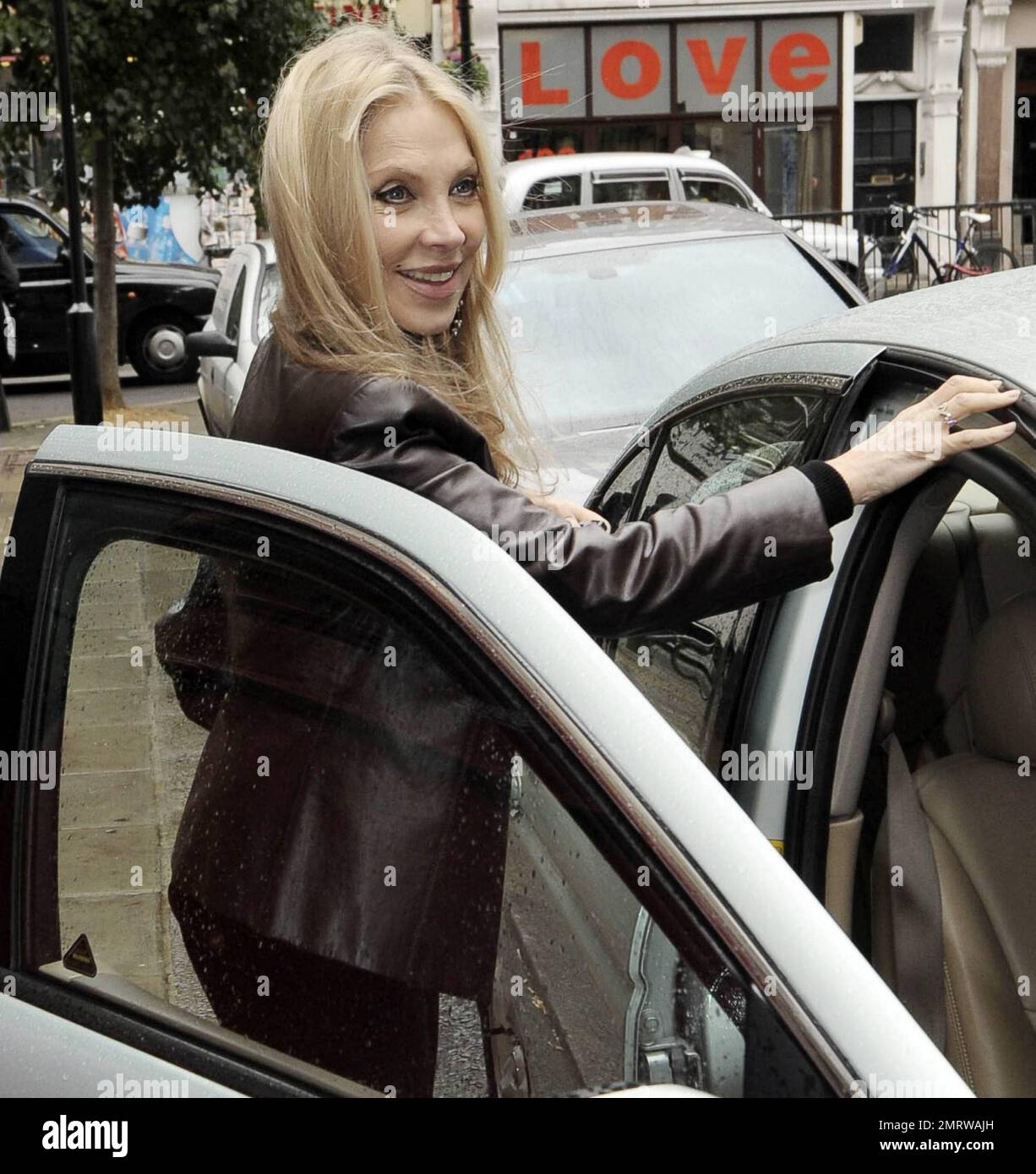 60-year-old British pop singer Lynsey de Paul smiles for the camera ...