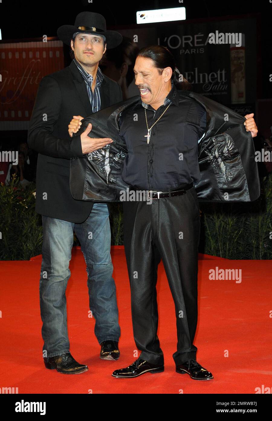 Robert Rodriguez and Danny Trejo attend the Machete premiere during the ...