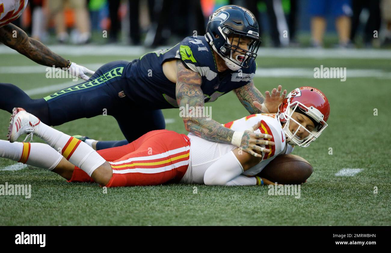 Seattle Seahawks' Cassius Marsh leaps on Kansas City Chiefs quarterback ...