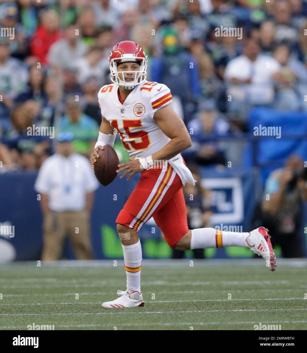 Kansas City Chiefs quarterback Patrick Mahomes looks to pass against ...
