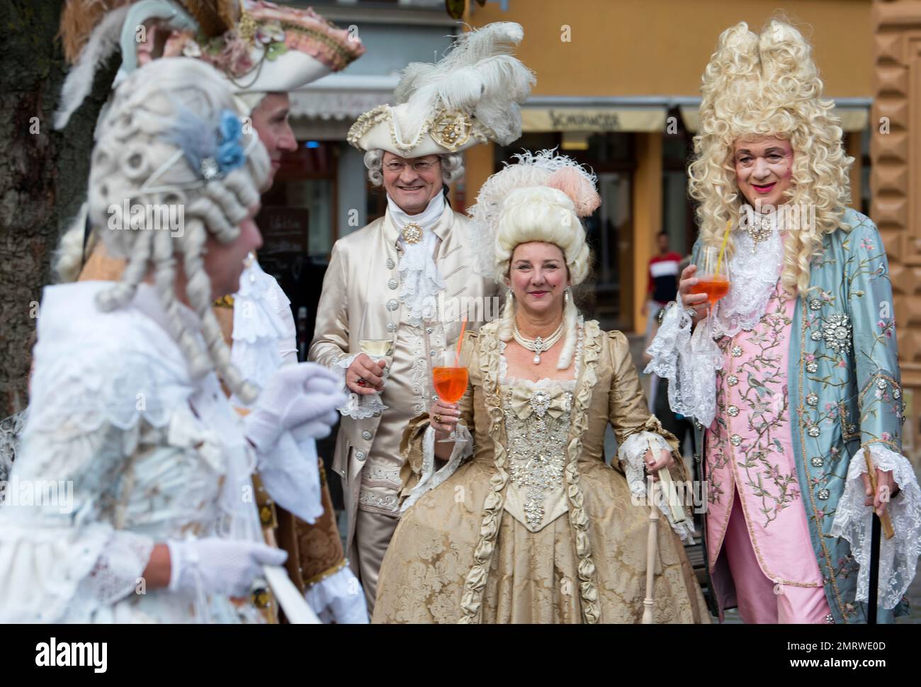 People dressed in Baroque costumes celebrate, during the opening of the ...