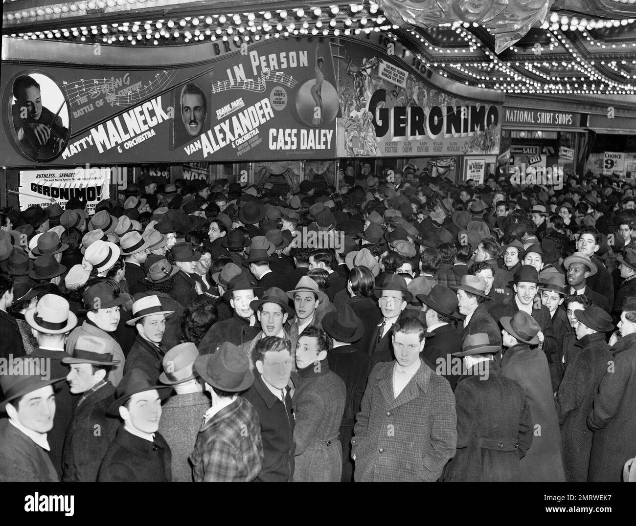 it is a mob scene under the marquee of the Paramount Theater in Times ...