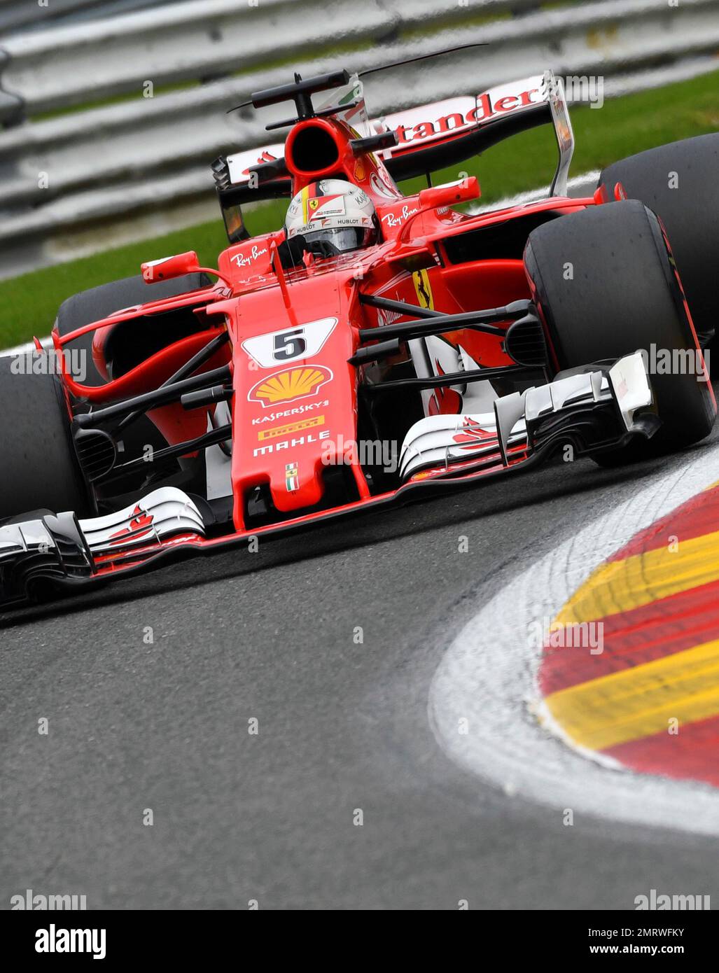Ferrari driver Sebastian Vettel of Germany steers his car during the ...