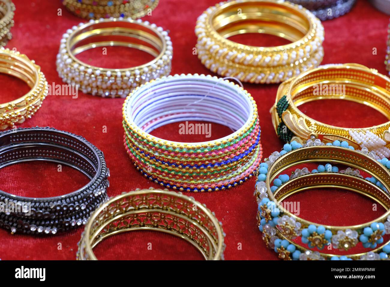 Indian colorful bangles displayed in local shop in a market of Pune ...