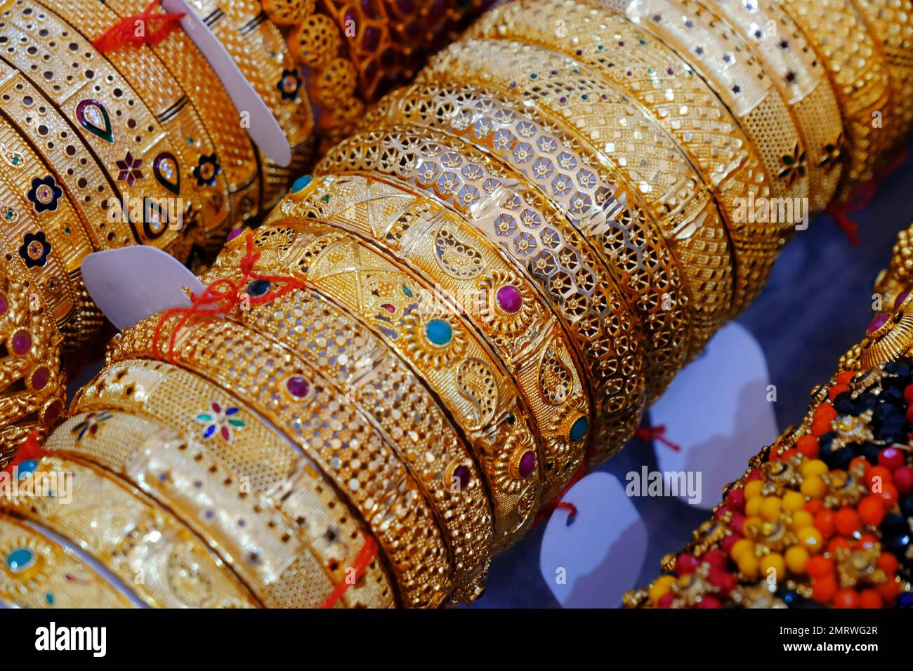 Indian colorful bangles displayed in local shop in a market of Pune ...
