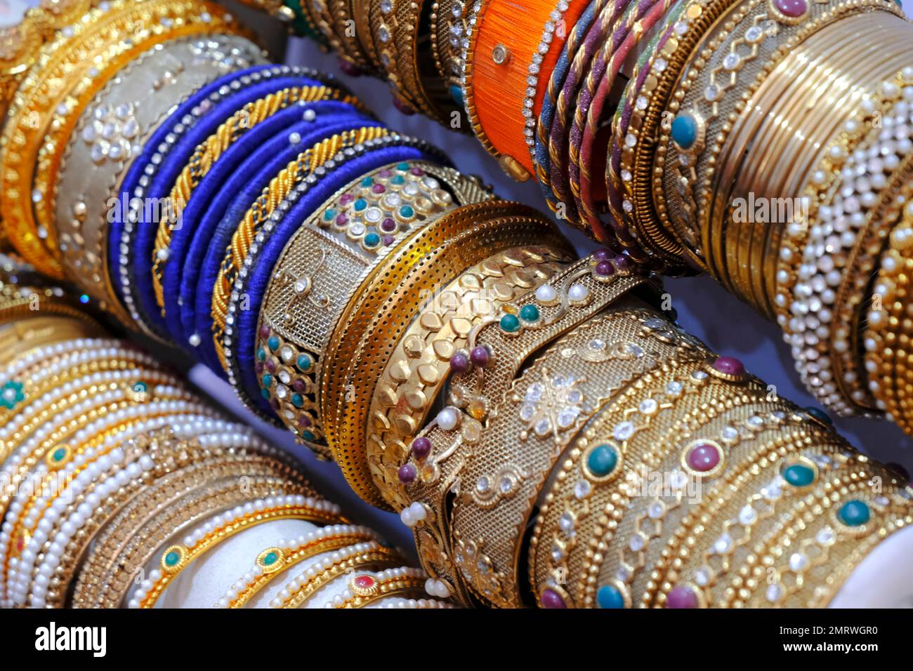 Indian colorful bangles displayed in local shop in a market of Pune ...