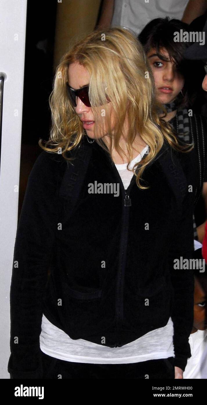 Madonna, son David Banda and reported boyfriend Jesus Luz arrive at the ...