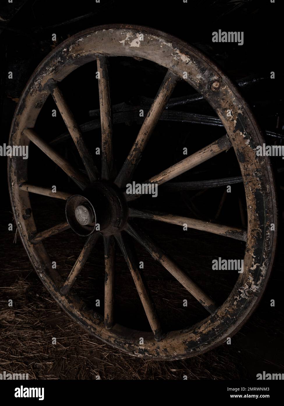 A vertical shot of an old rusty wheel of a horse buggy Stock Photo - Alamy