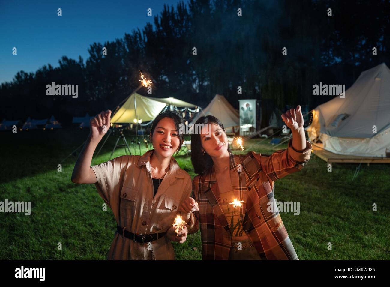 Night at the campsite with fireworks Stock Photo - Alamy