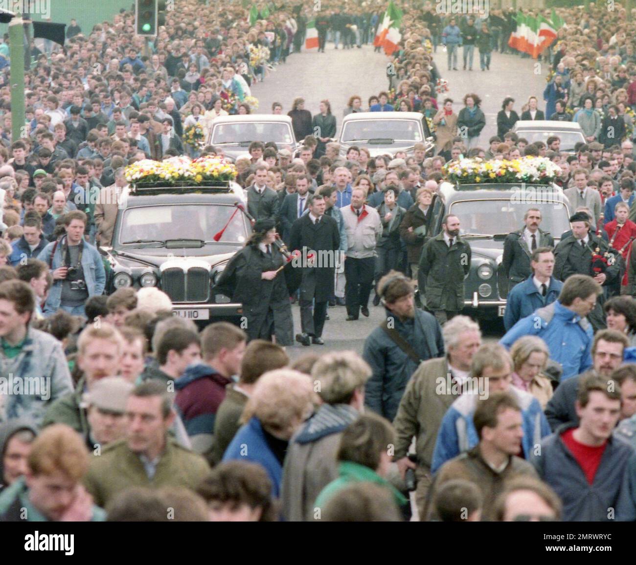 Mourners including Martin McGuinness, walk during the funeral for Sean ...