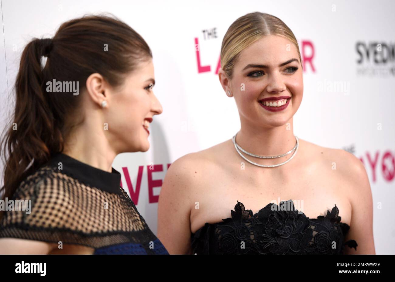 Alexandra Daddario, left, and Kate Upton arrive at the Los Angeles ...