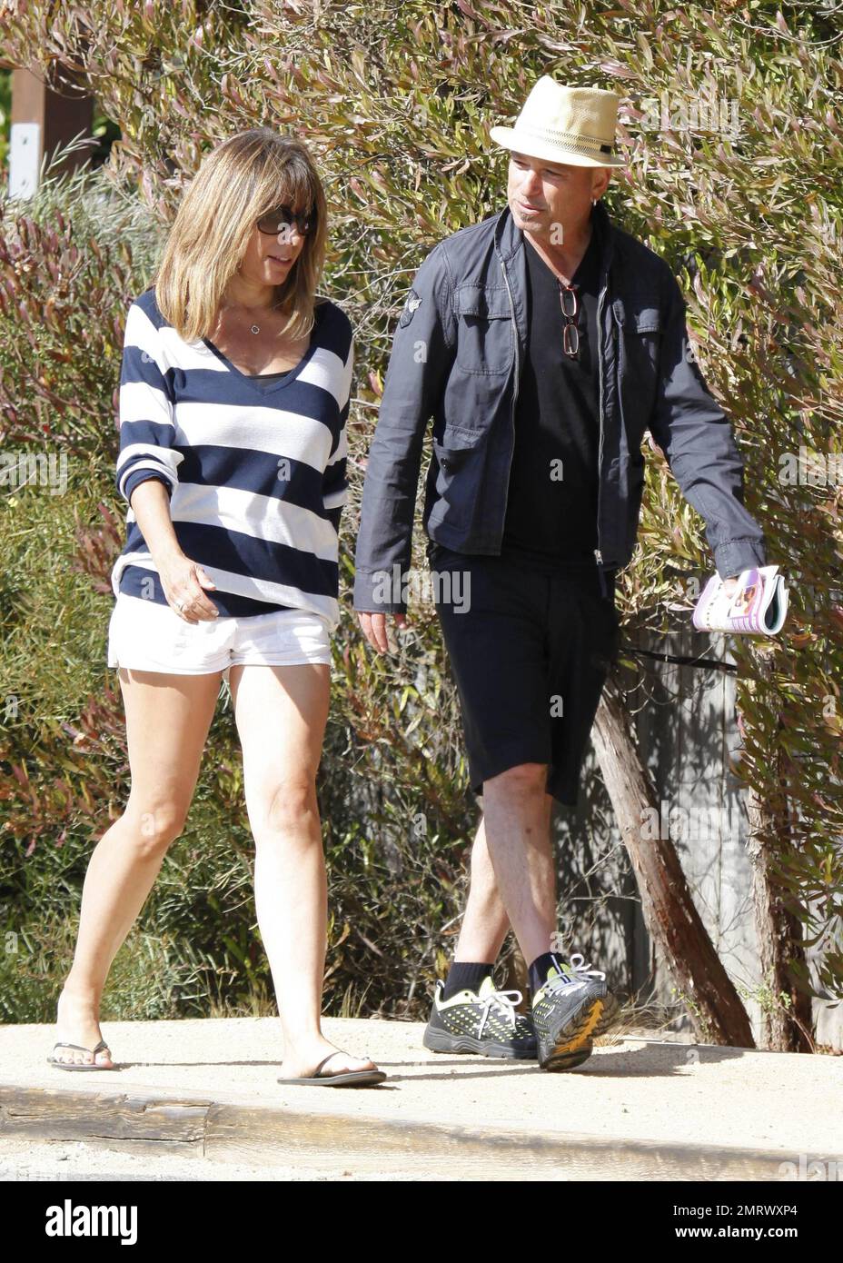 'Deal or No Deal' host Howie Mandel enjoys Labor Day Weekend by taking a stroll with his wife ...