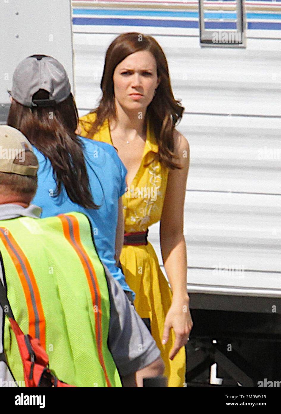 Mandy Moore wears a yellow dress andange pumps while on the set of her ...
