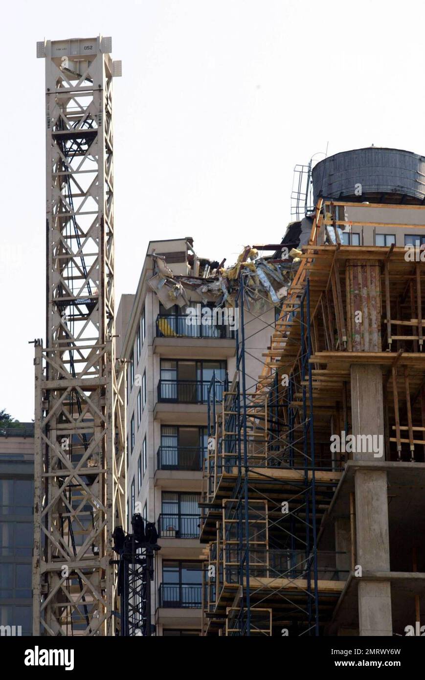 A construction crane collapsed today in New York City on the corner of ...