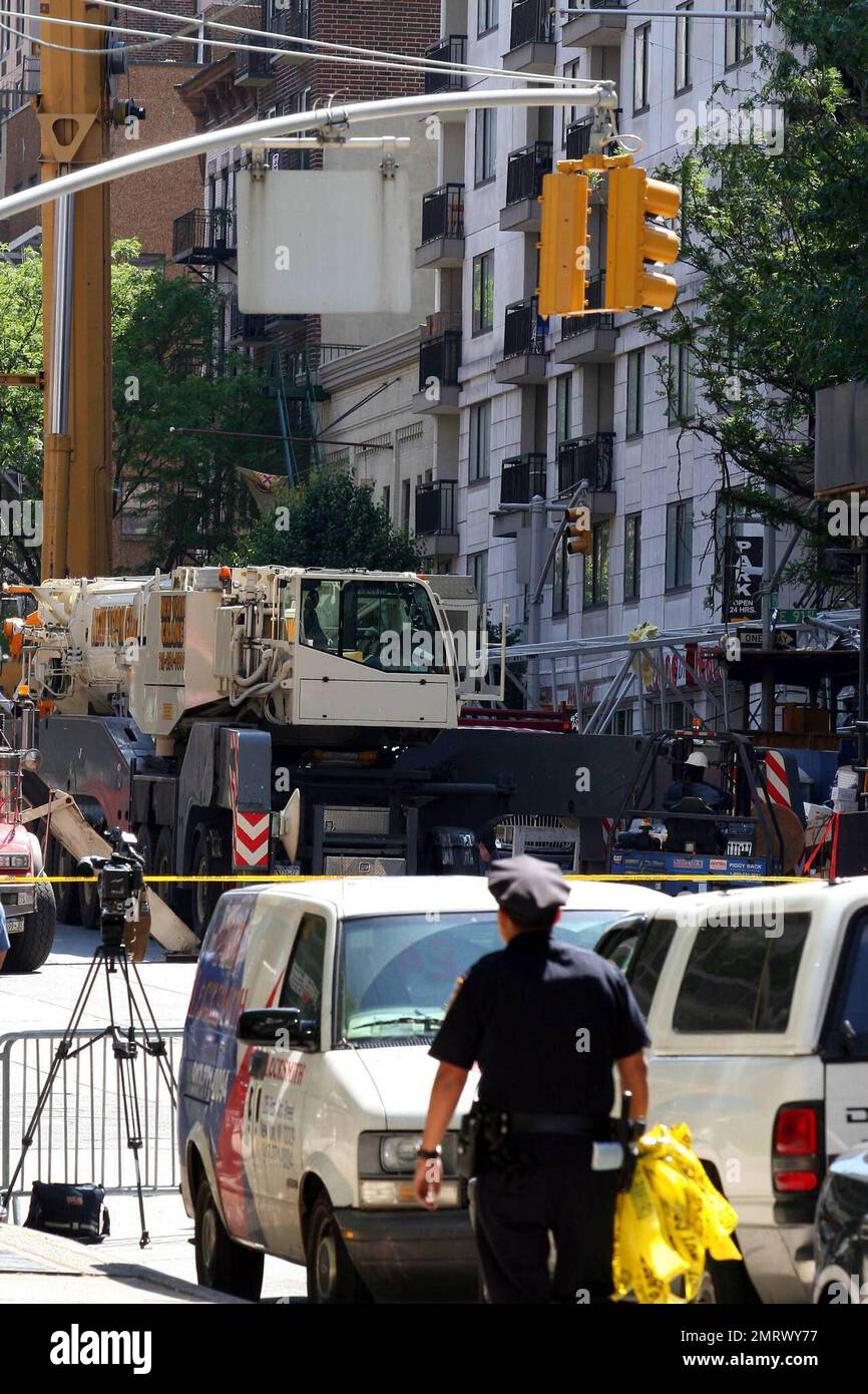 A construction crane collapsed today in New York City on the corner of ...
