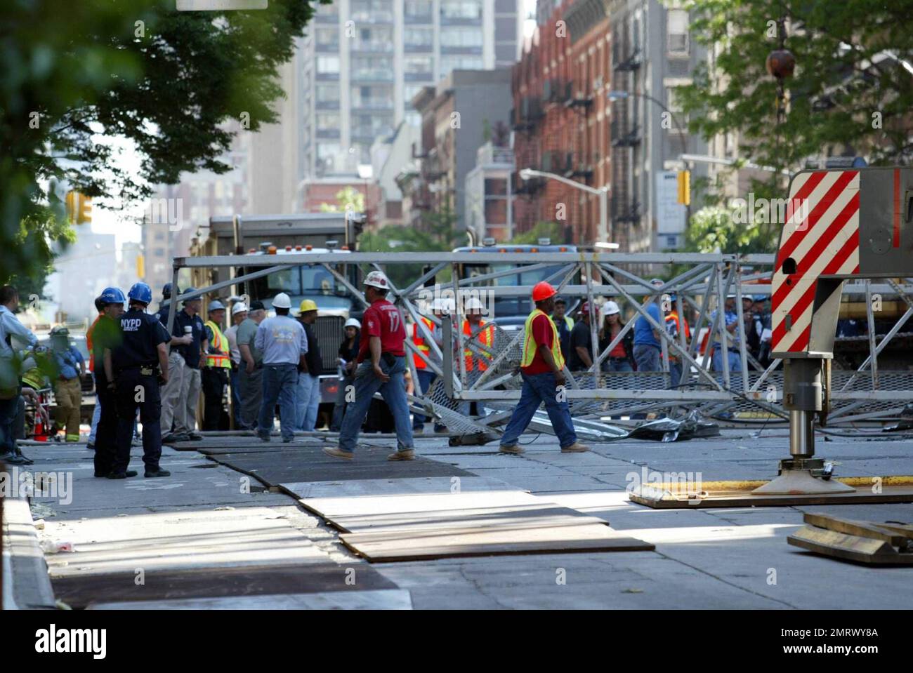 A construction crane collapsed today in New York City on the corner of ...