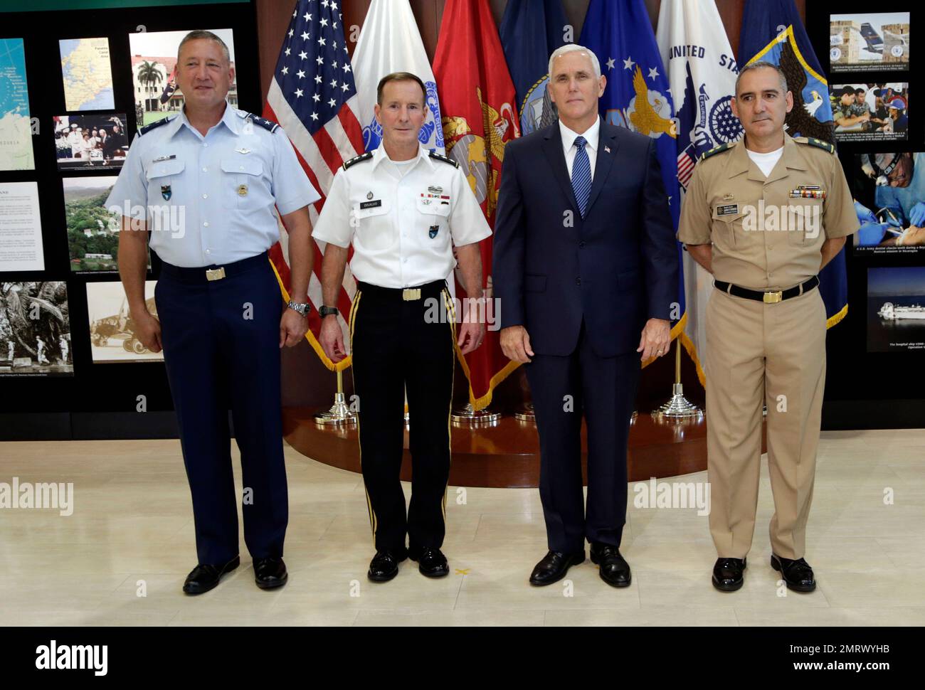 Vice President Mike Pence, second from right, poses for a photograph ...