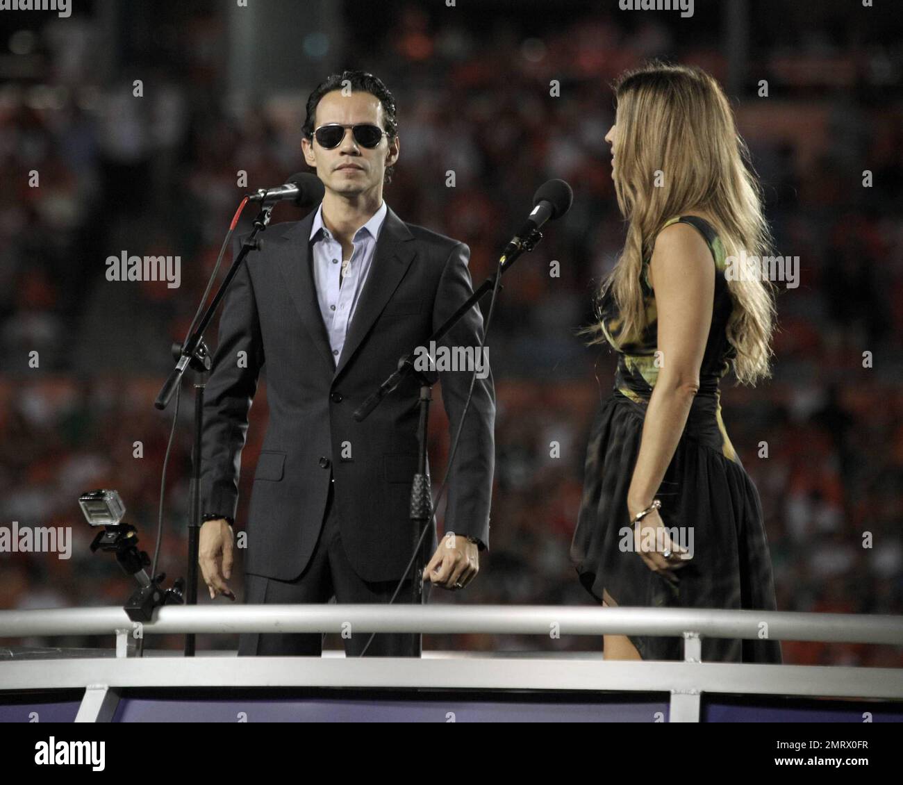Singers Marc Anthony and Fergie (aka Stacy Ferguson) sing the national ...