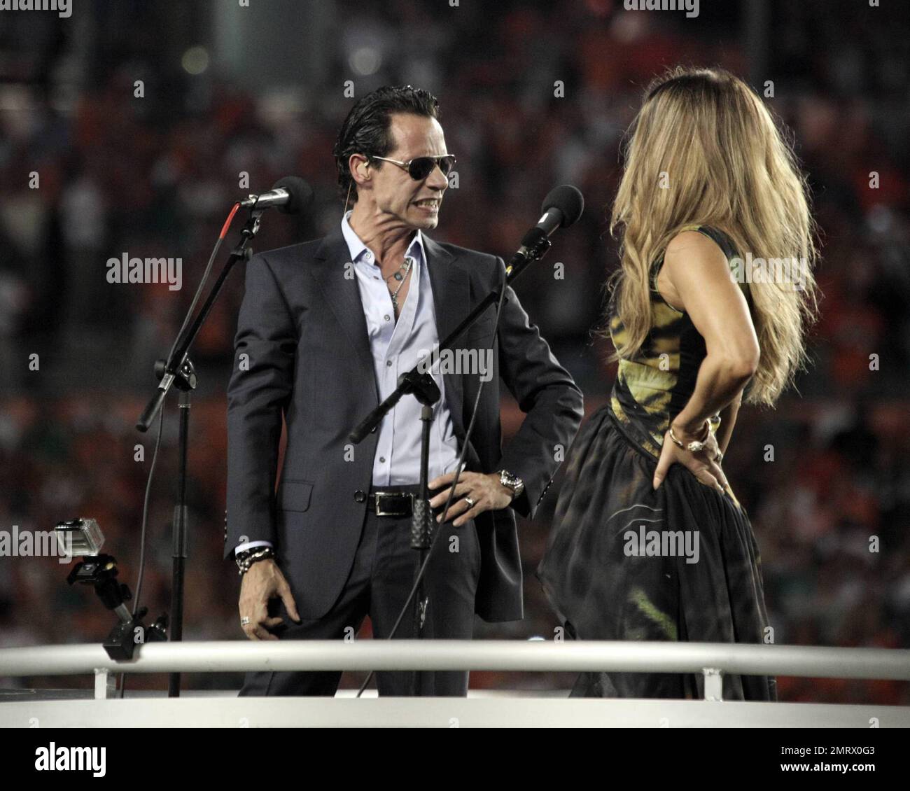 Singers Marc Anthony and Fergie (aka Stacy Ferguson) sing the national ...