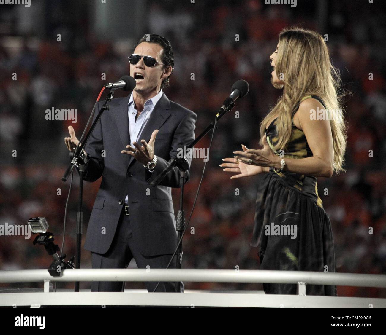 Singers Marc Anthony and Fergie (aka Stacy Ferguson) sing the national ...