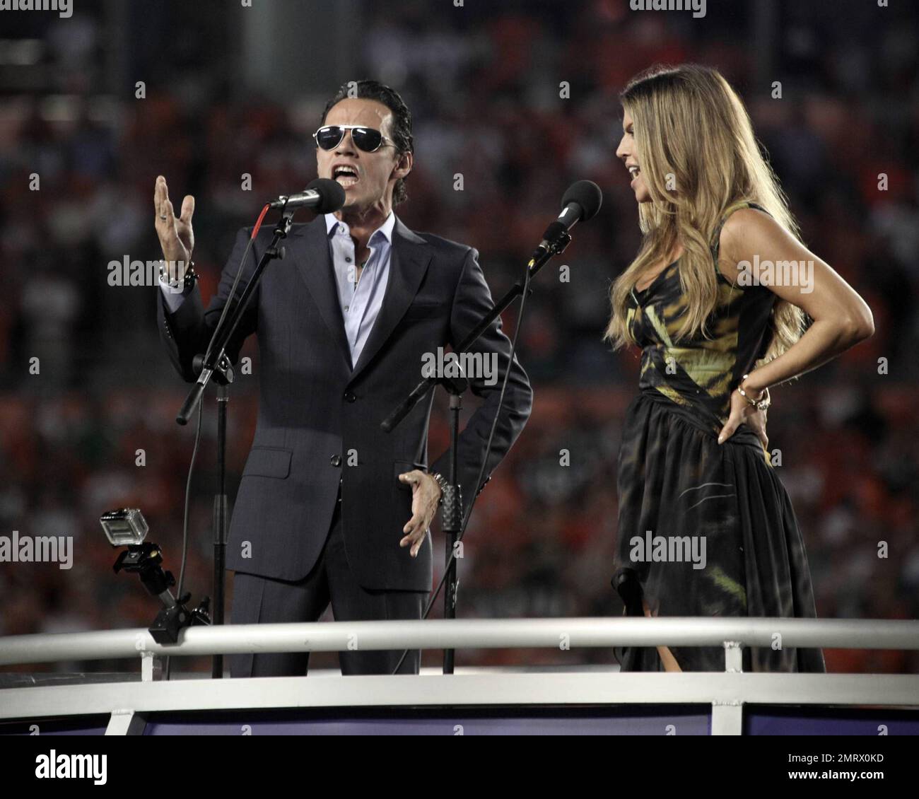 Singers Marc Anthony and Fergie (aka Stacy Ferguson) sing the national ...