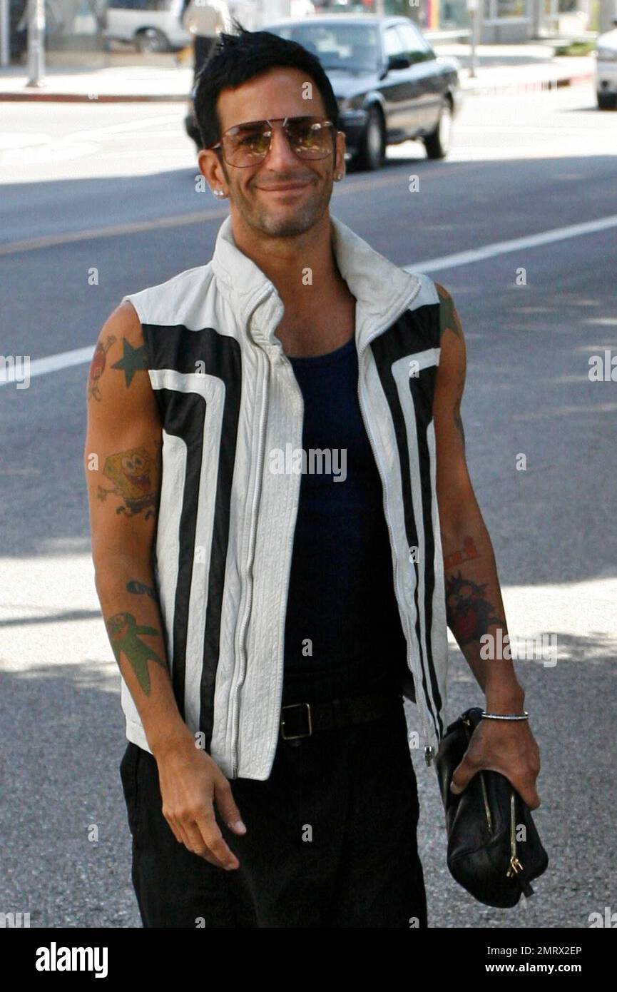 Marc Jacobs, sporting tattoos including Spongebob Squarepants and an M ...