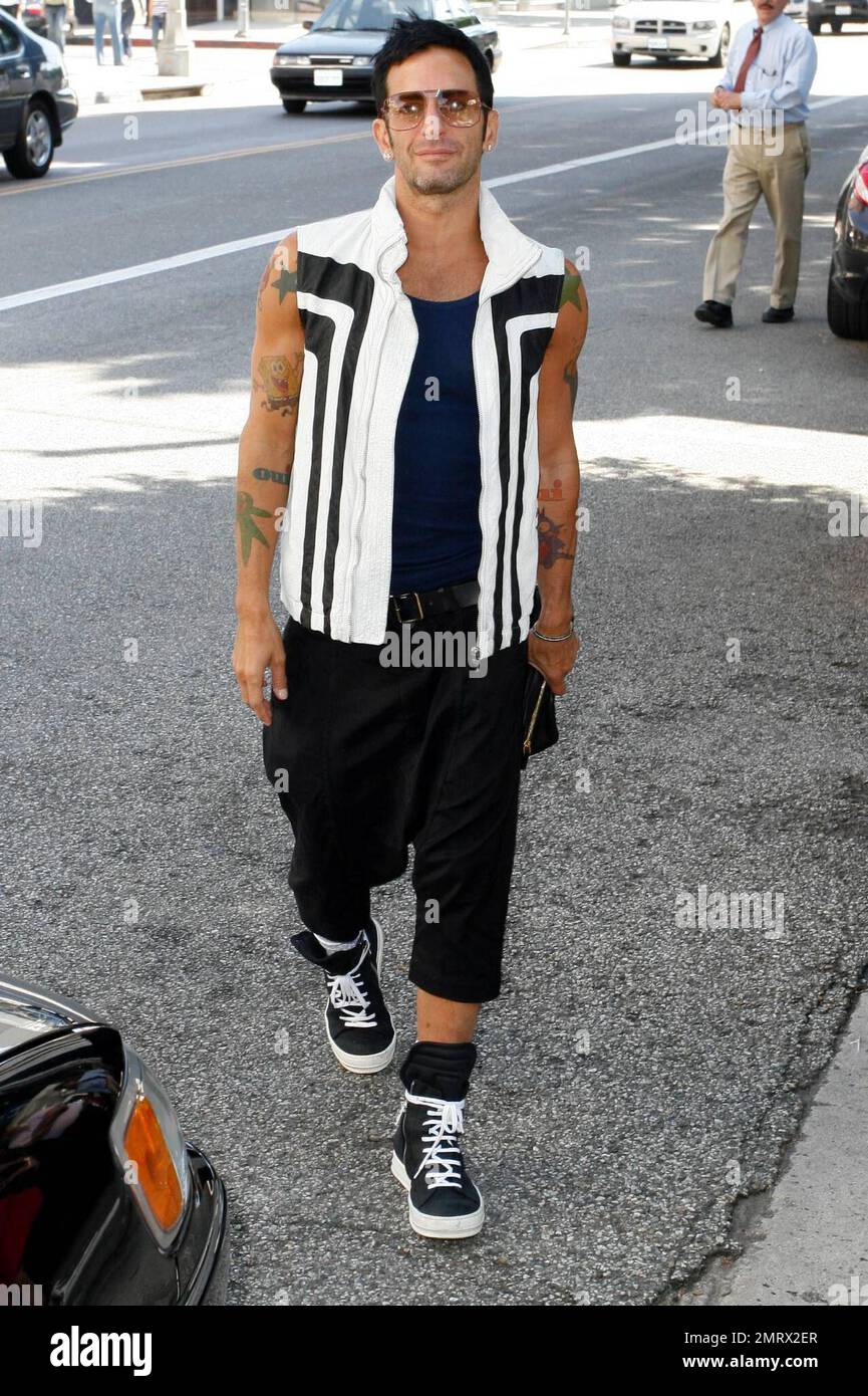 Marc Jacobs, sporting tattoos including Spongebob Squarepants and an M ...